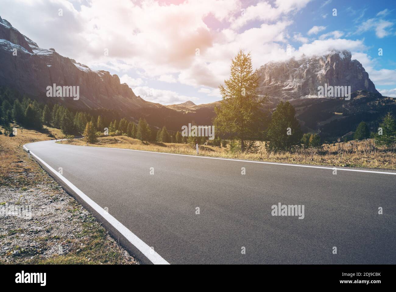 Beautiful mountain road with trees, forest and mountains in the ...