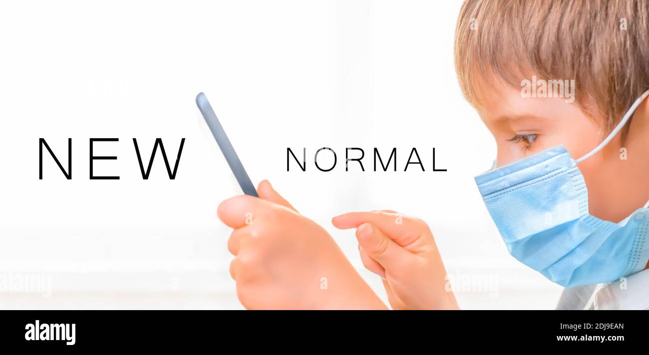 Kid in Medical Mask Using Tablet. Little Boy Wearing Mask Study Online ...