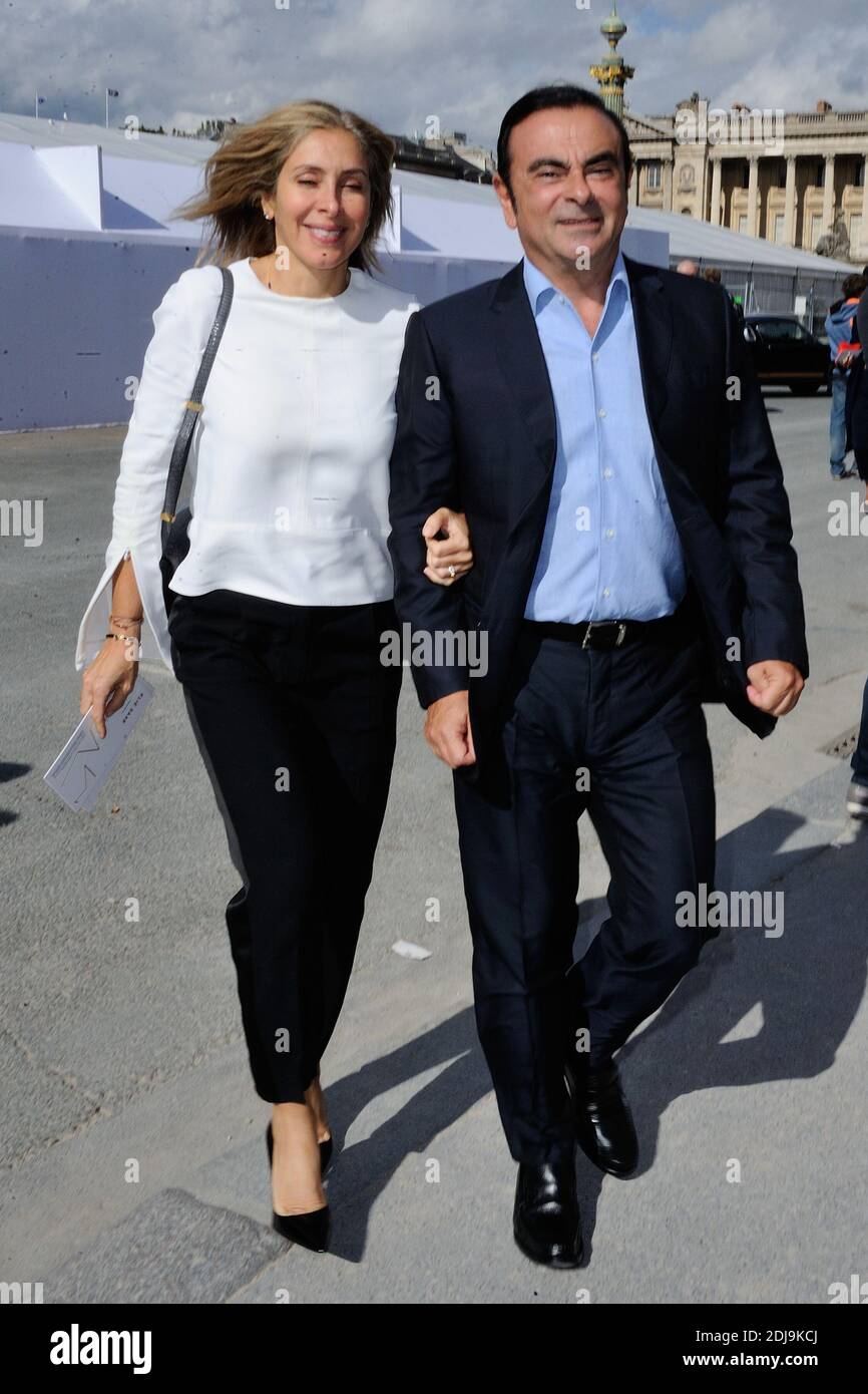 Carlos Ghosn and his wife Carole Ghosn arriving at the Elie Saab show ...