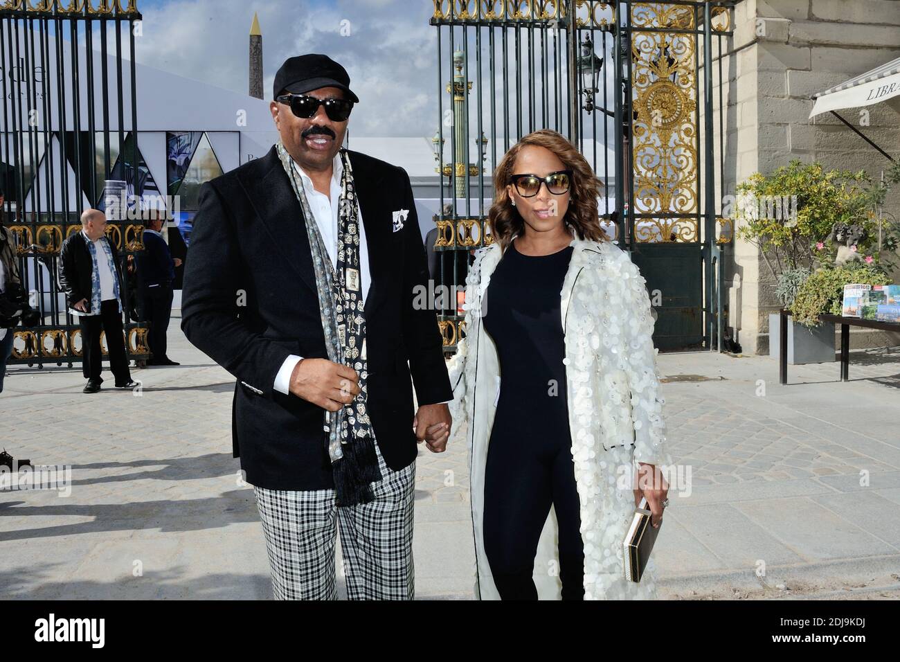 Steve Harvey and Marjorie Harvey arriving at the Elie Saab show as a ...