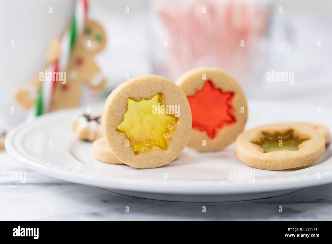 Christmas butter stained glass window cookies Stock Photo - Alamy