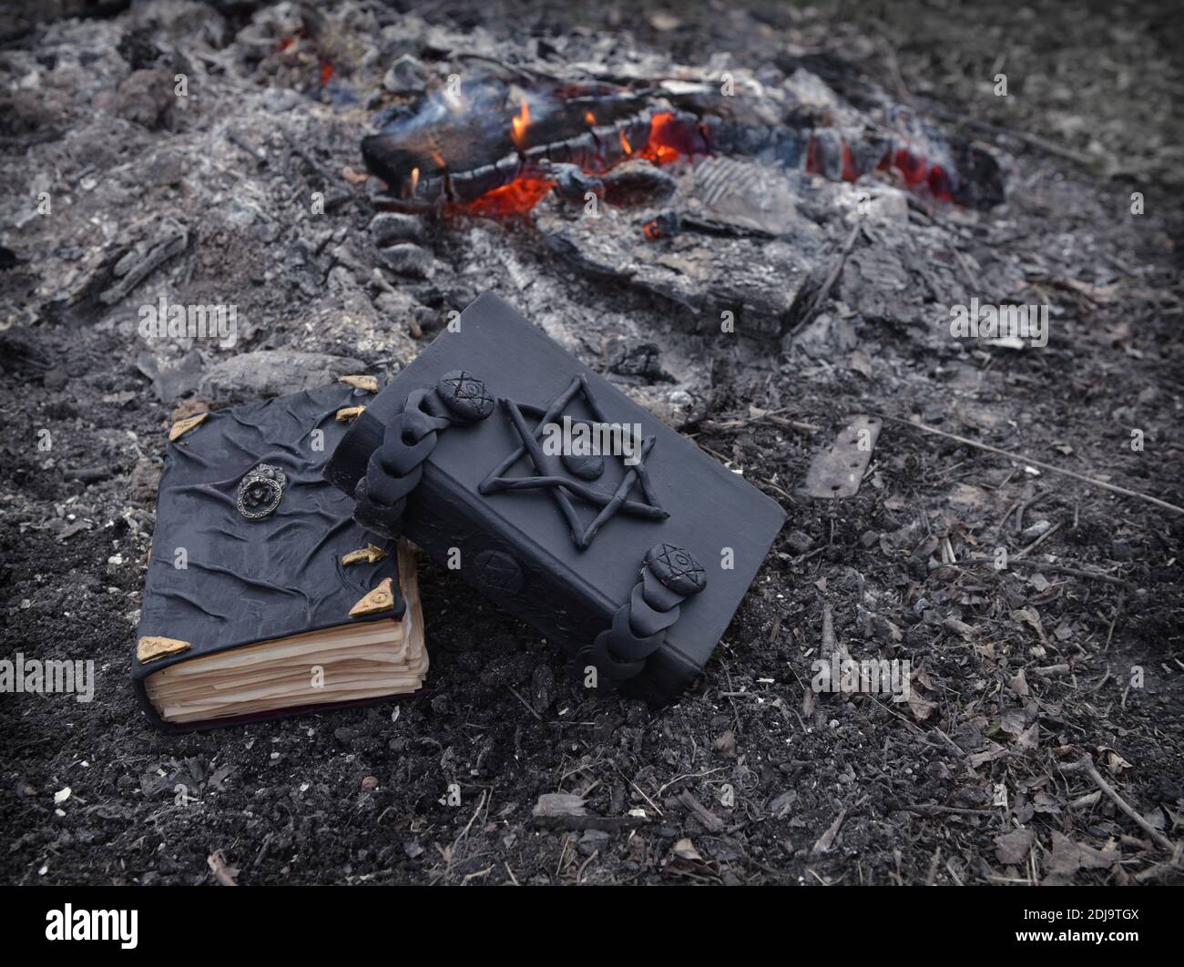 Mystical concept with voodoo objects, book and straw doll, esoteric ...