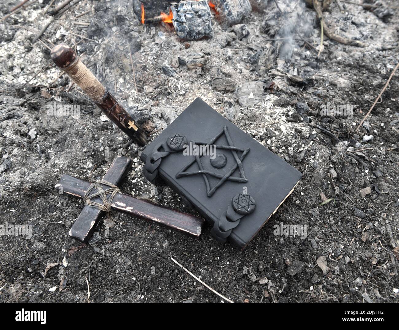 Mystical concept with voodoo objects, book and straw doll, esoteric ...