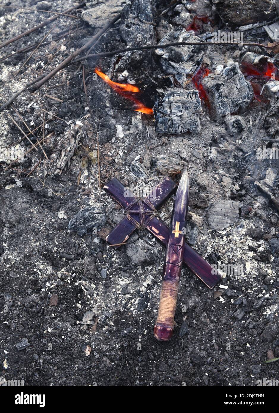 Mystical concept with voodoo objects, book and straw doll, esoteric ...