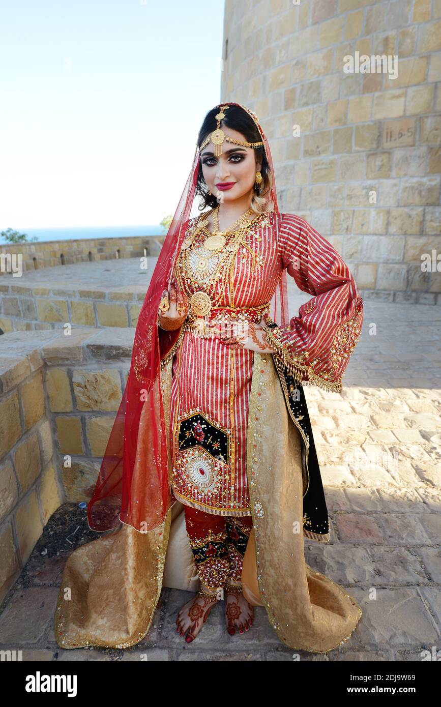 A beautiful model wearing a traditional Omani dress Stock Photo - Alamy