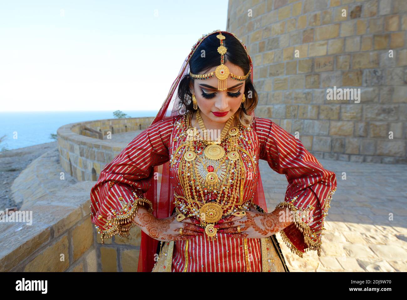 A beautiful model wearing a traditional Omani dress Stock Photo - Alamy
