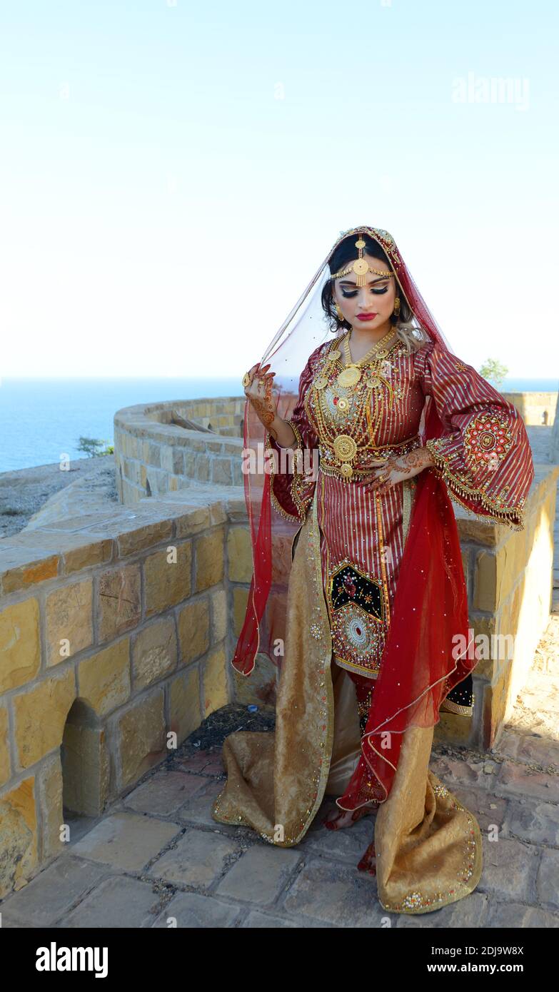 A beautiful model wearing a traditional Omani dress Stock Photo - Alamy