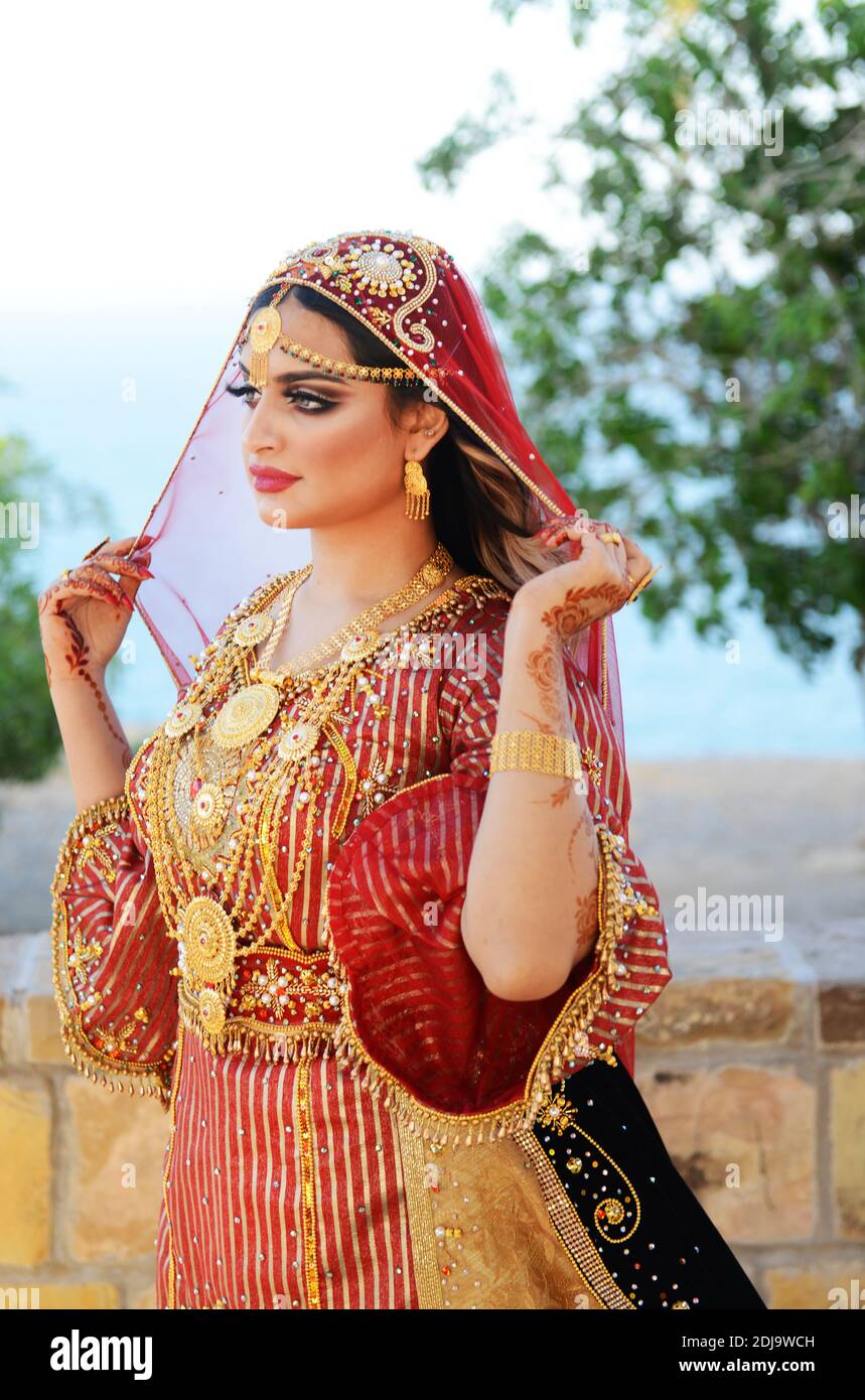 A beautiful model wearing a traditional Omani dress Stock Photo - Alamy