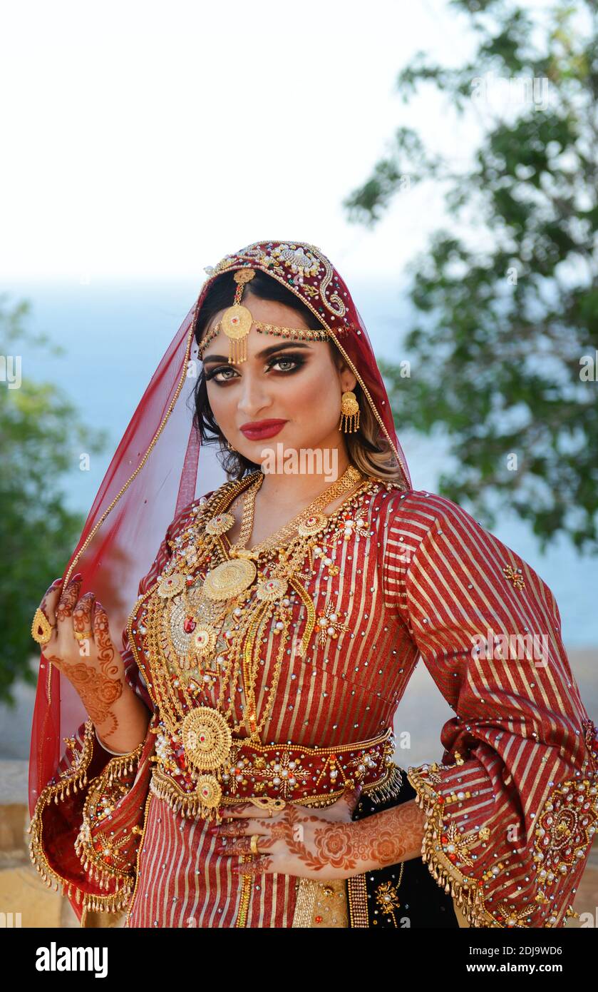 A beautiful model wearing a traditional Omani dress Stock Photo - Alamy