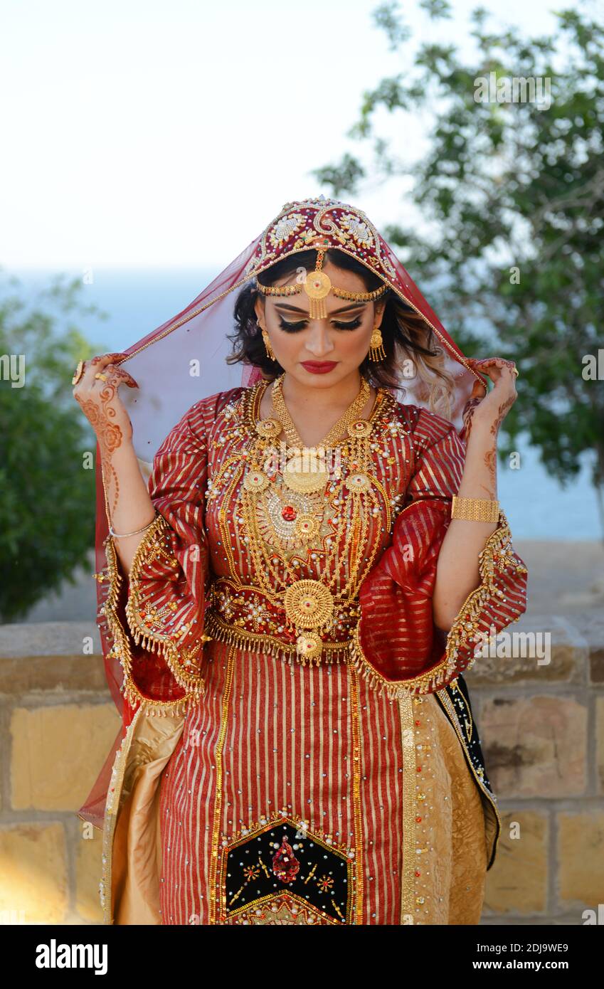 A beautiful model wearing a traditional Omani dress Stock Photo - Alamy
