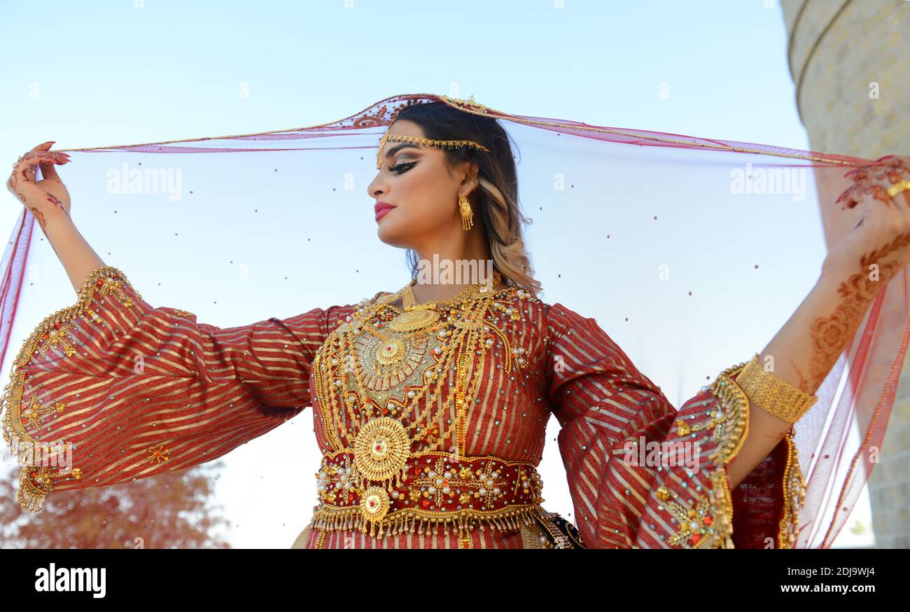 A beautiful model wearing a traditional Omani dress Stock Photo - Alamy