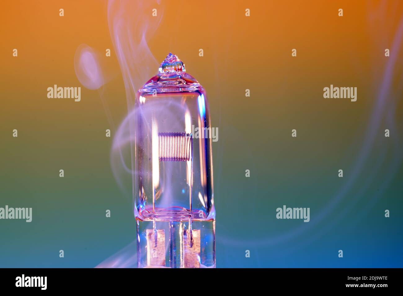 A burning vacuum LED tube on a gradi Stock Photo - Alamy