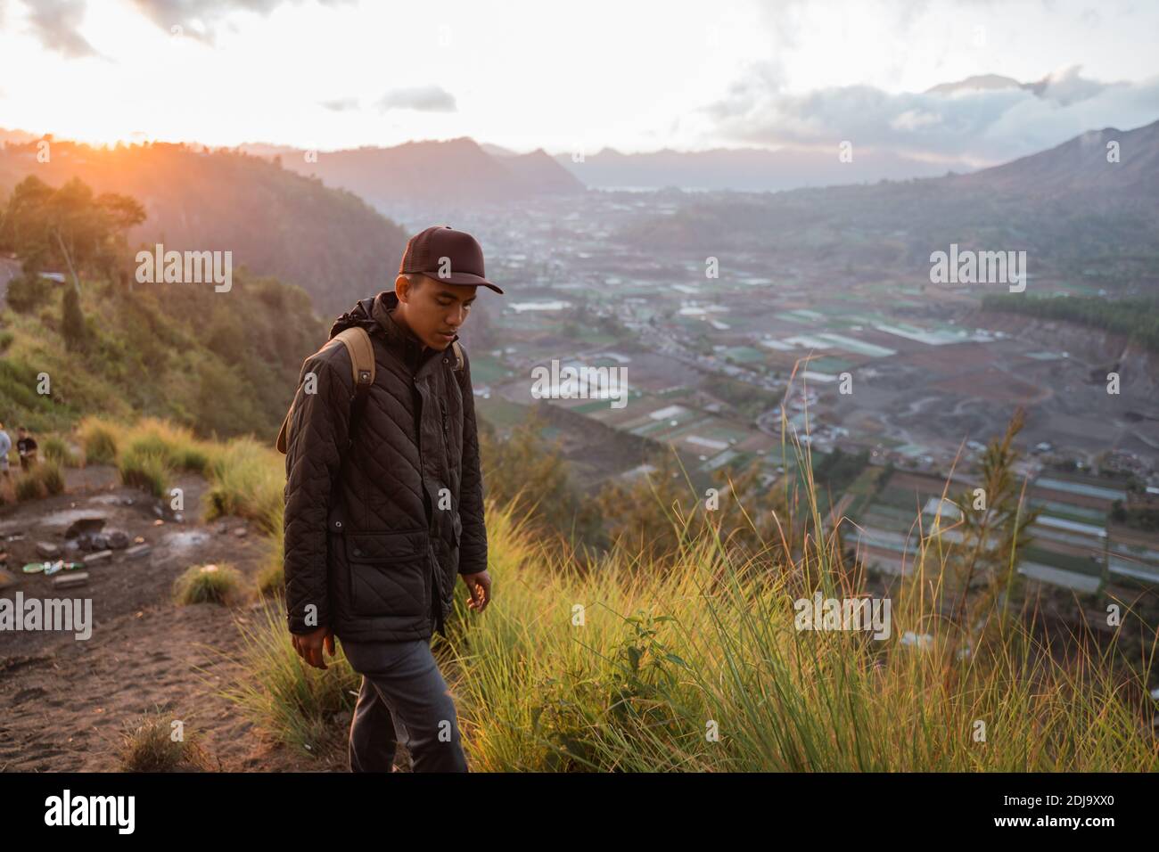 Portrait adventurous man with a backpack captures the moment. Beautiful ...