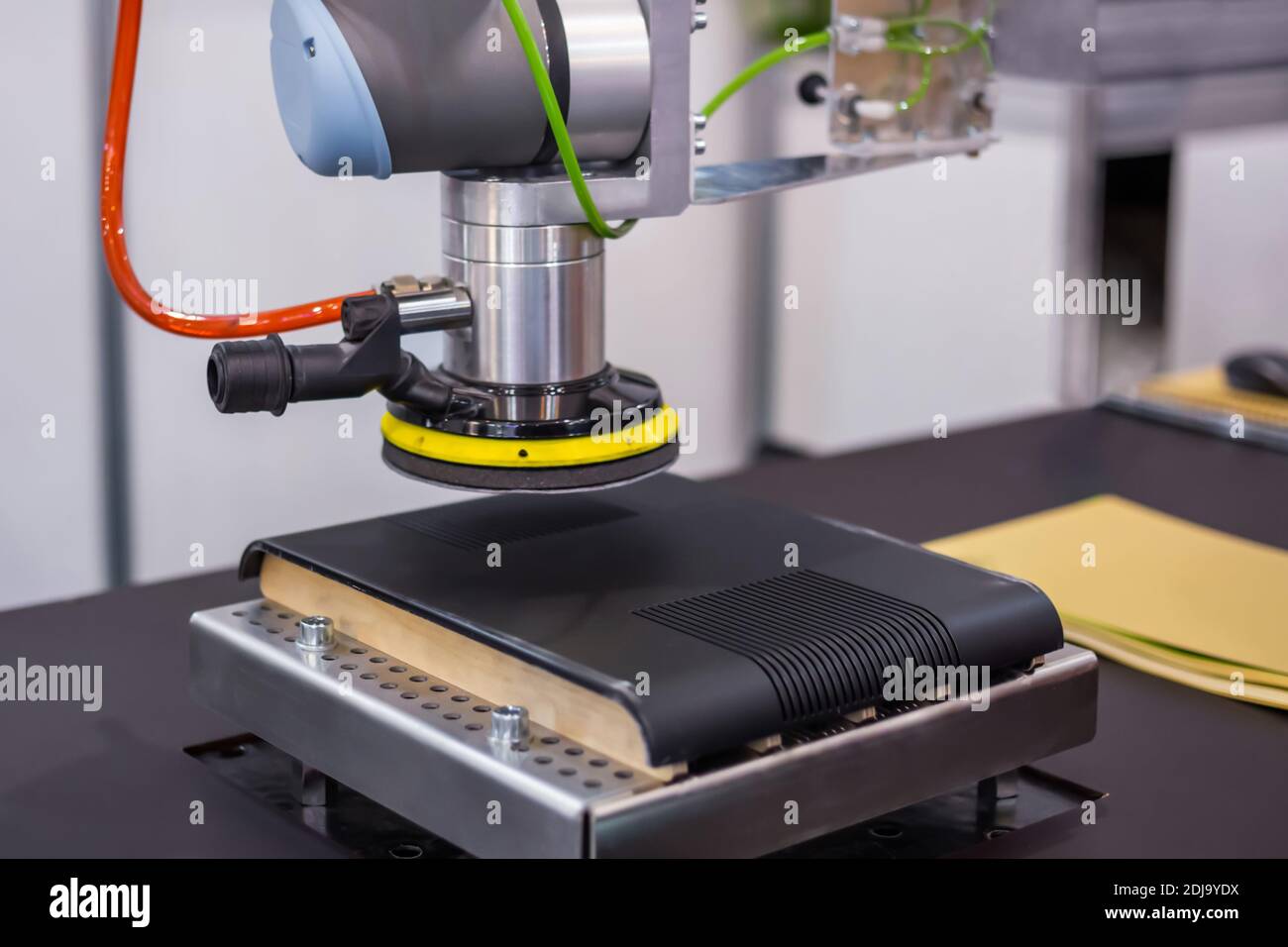 Automated robotic arm moves and places objects at trade show ...