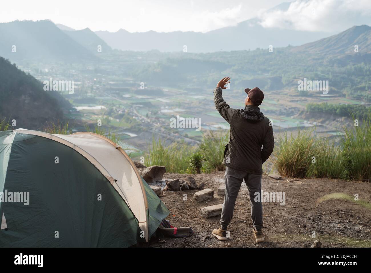 Portrait adventurous man camping captures the moment. Beautiful ...