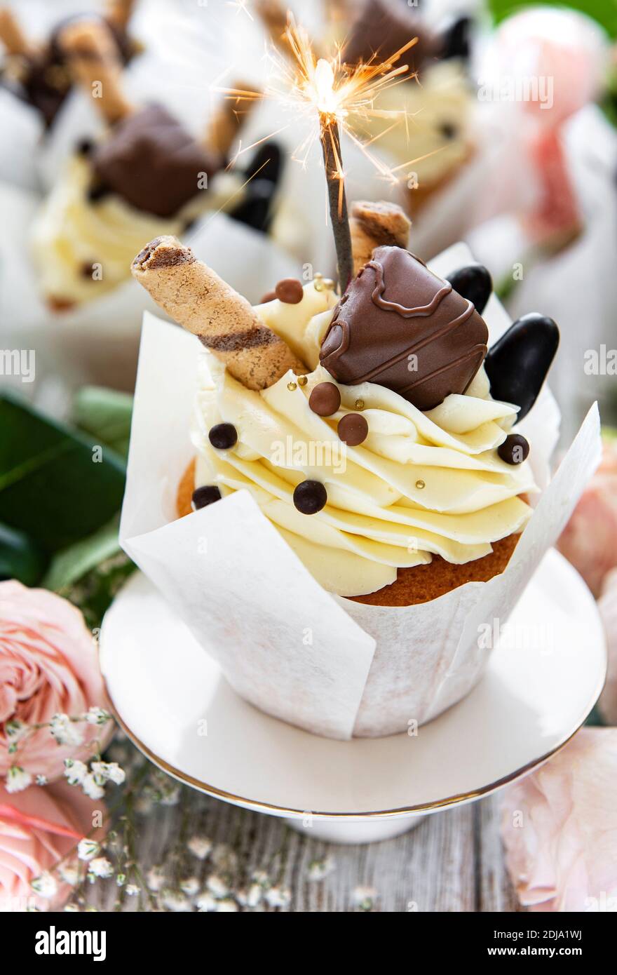 Delicious birthday cupcakes sparklers hi-res stock photography and ...