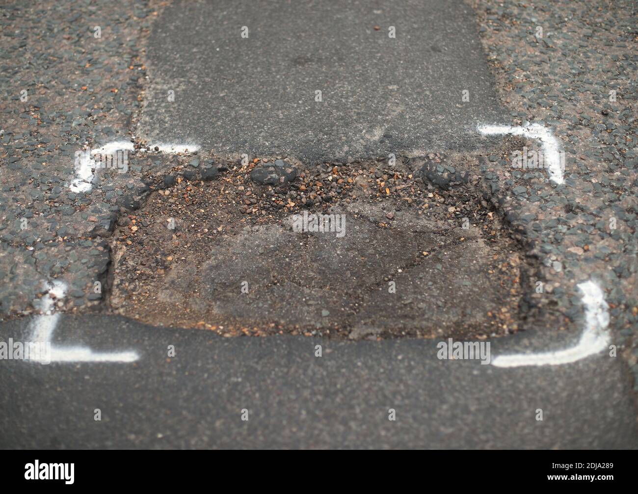 File photo dated 11/05/18 of a pothole on a London road. Pothole ...