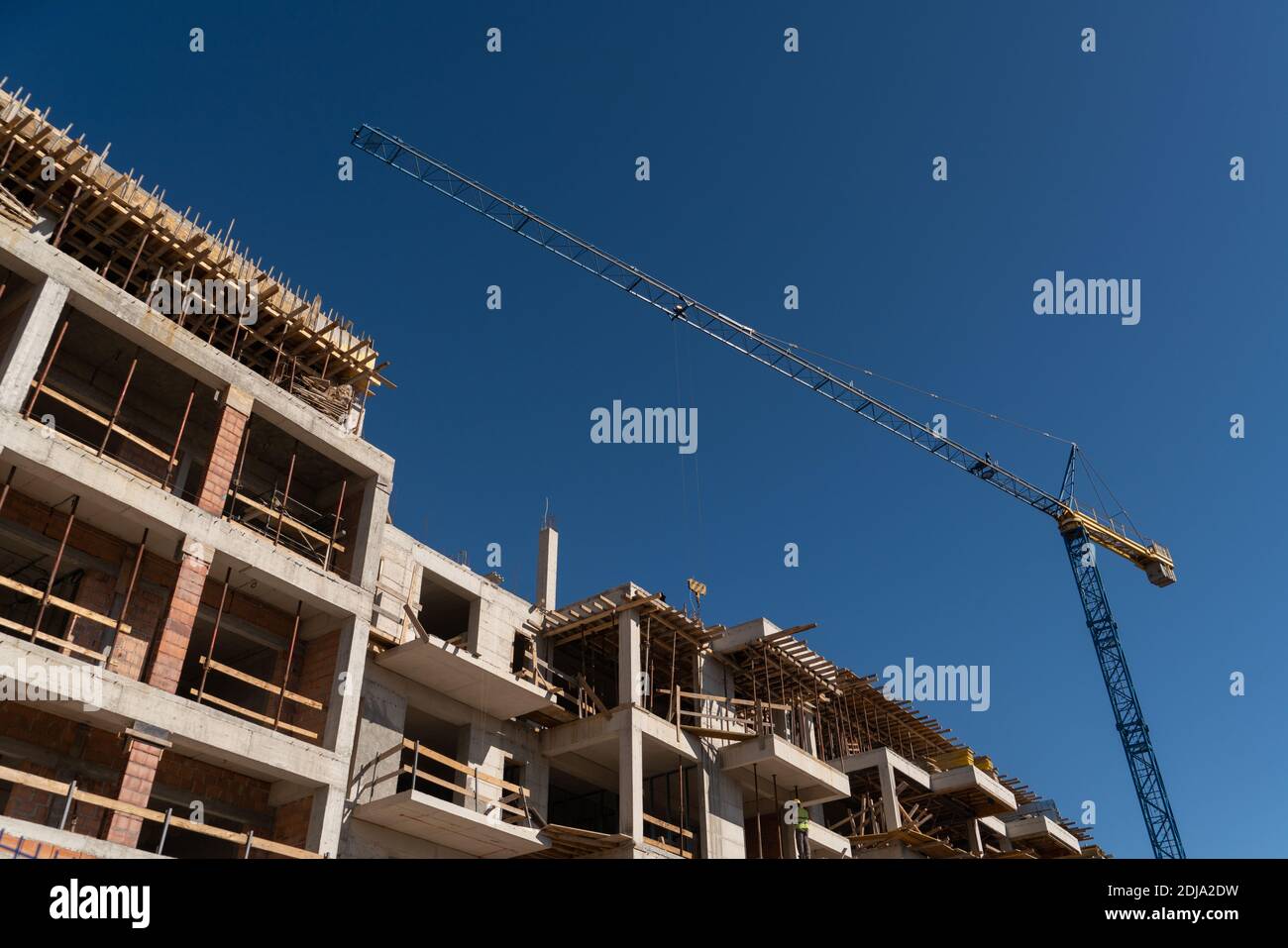 Construction of a building with a remotely controlled unmanned crane ...
