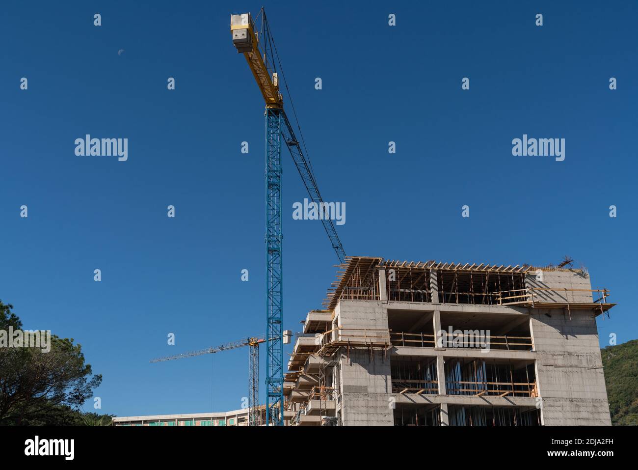 Construction of a building with a remotely controlled unmanned crane ...