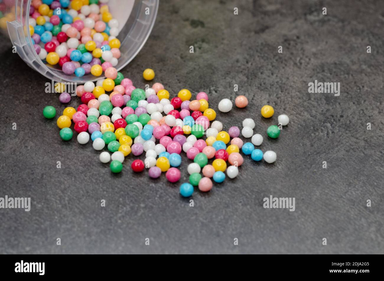 Round, multi-colored candies. Candy closeup on a white background Stock ...