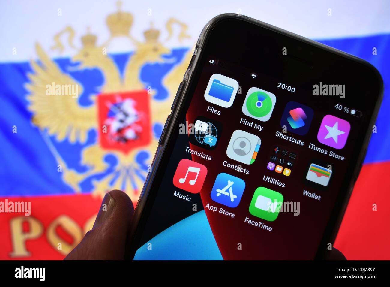 An illustration photo of a mobile phone with apps and Russian flag on ...