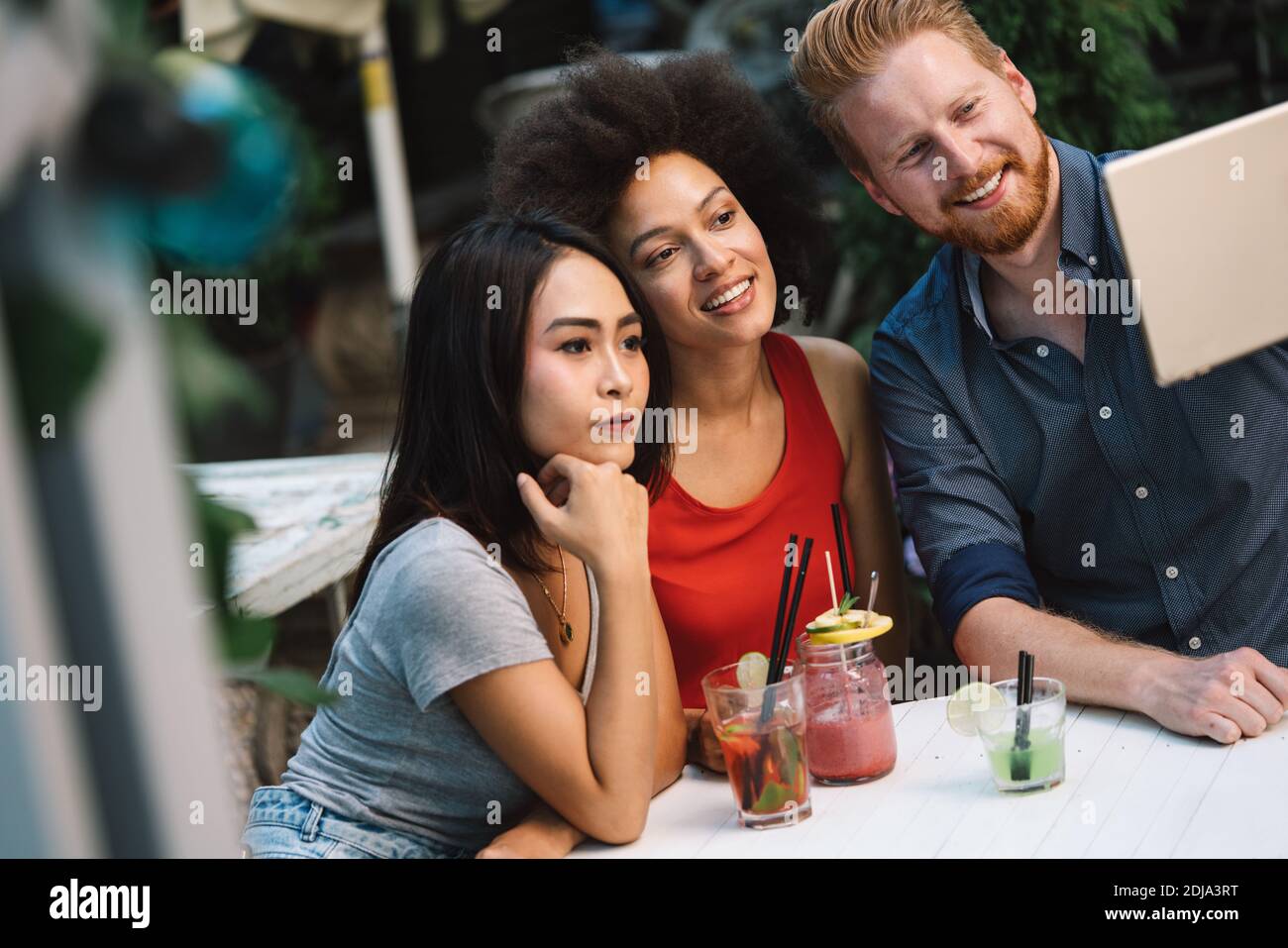 Group of friends having fun together. People talking laughing and ...