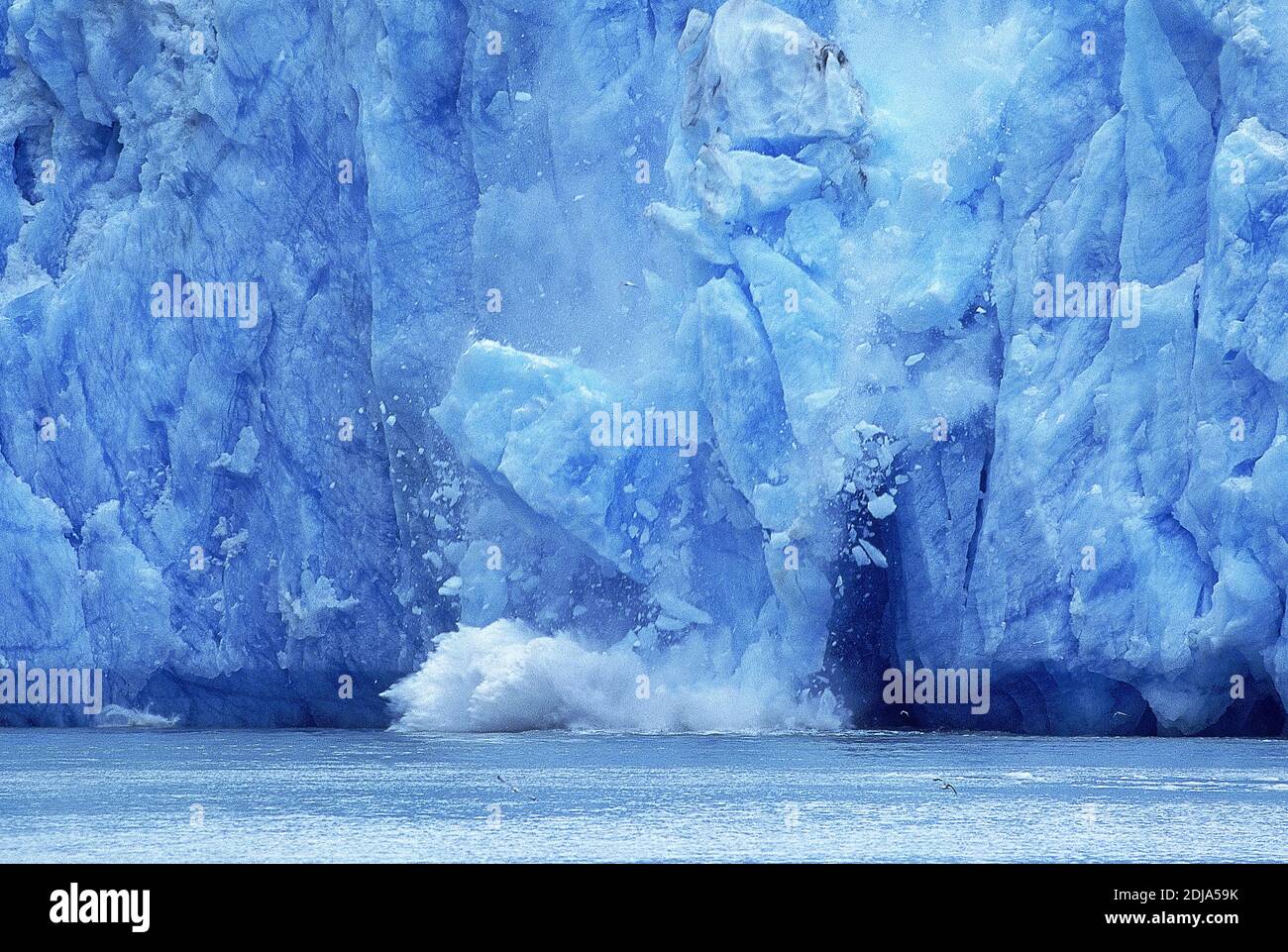 Glacier in Alaska, Piece of Ice falling into Ocean, Symbol for the ...