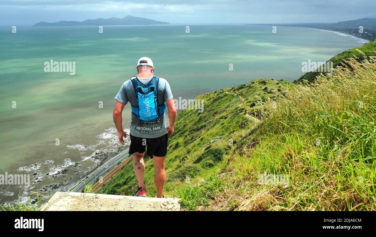 Walking down a steep hill side view hi-res stock photography and images ...