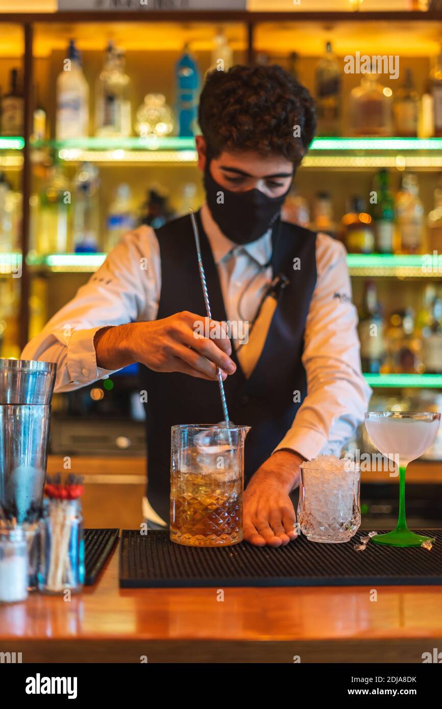 Waiter making cocktail hi-res stock photography and images - Alamy