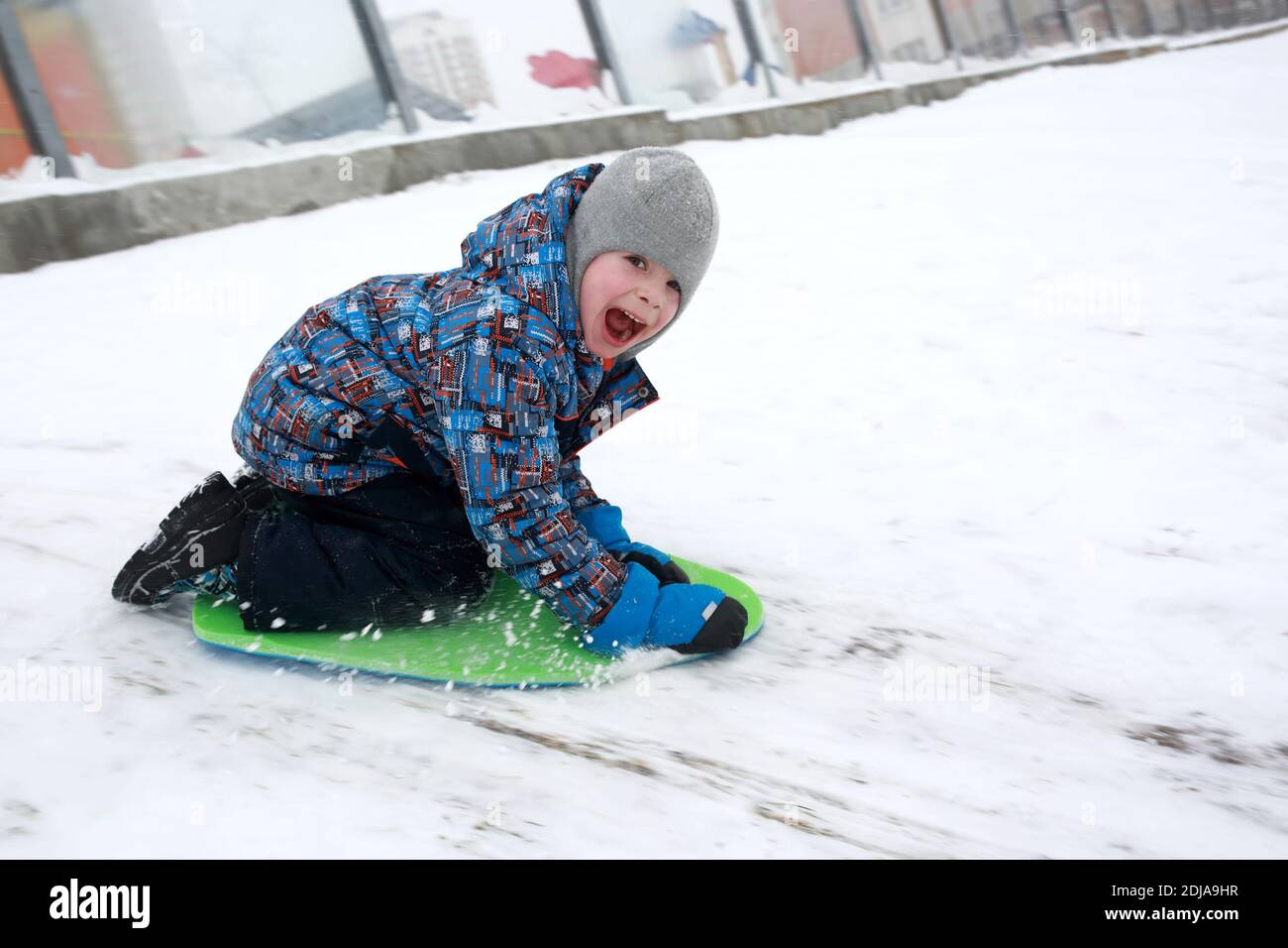 Rolls down the slide hi-res stock photography and images - Alamy