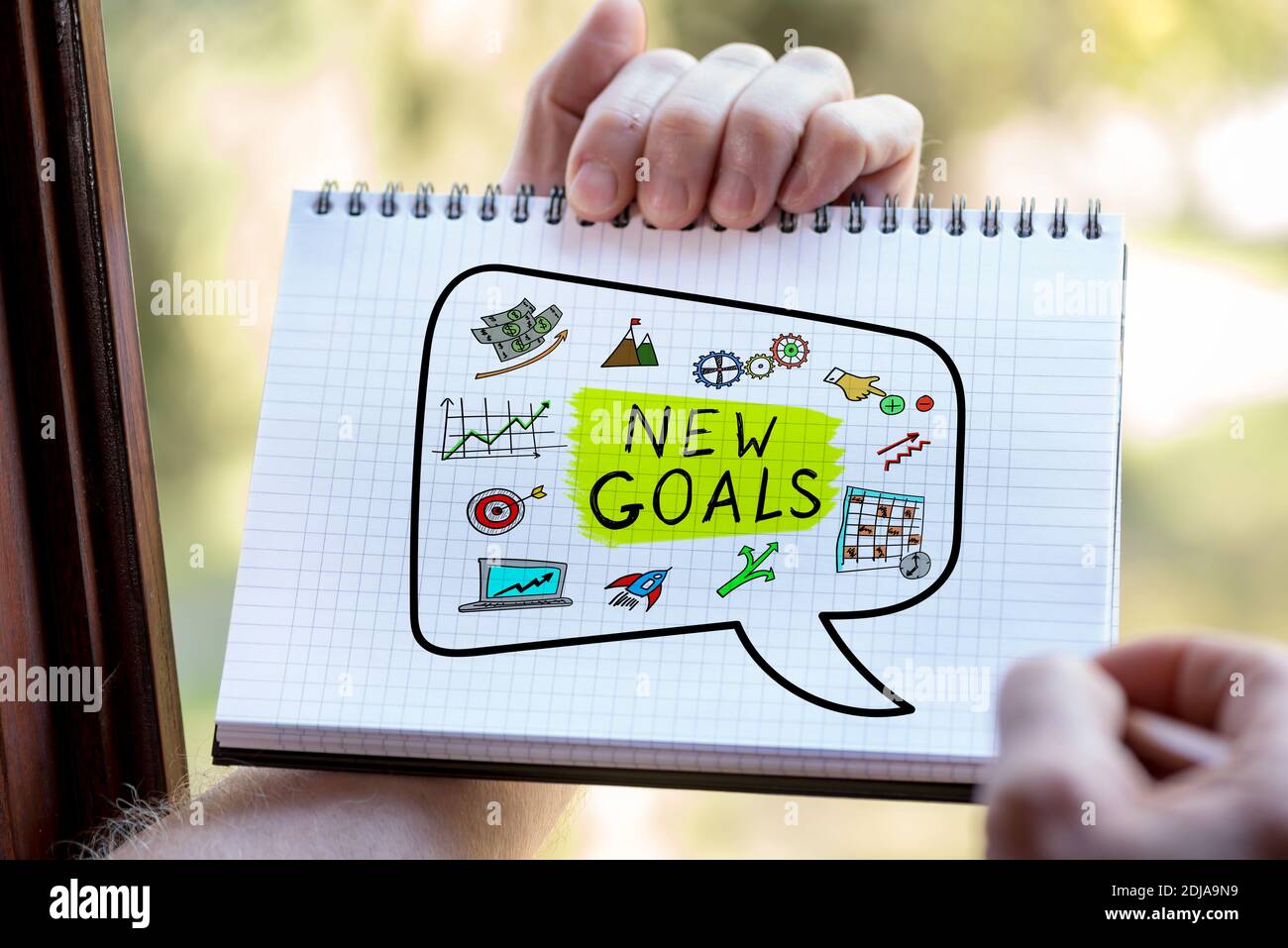 Hand drawing new goals concept on a notepad Stock Photo - Alamy