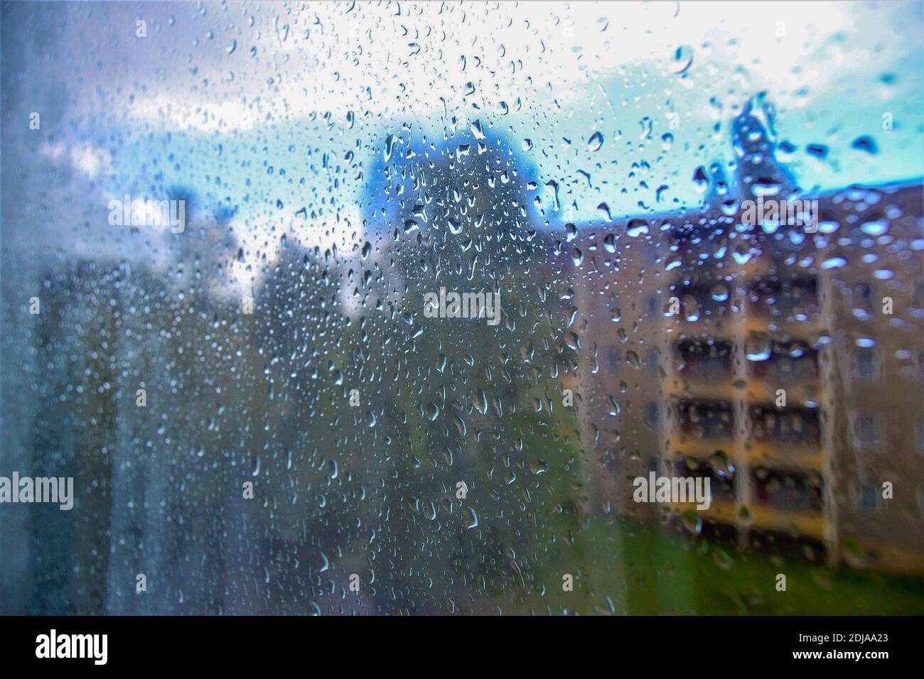Raindrops on the window in Chemnitz during overcast weather Stock Photo ...