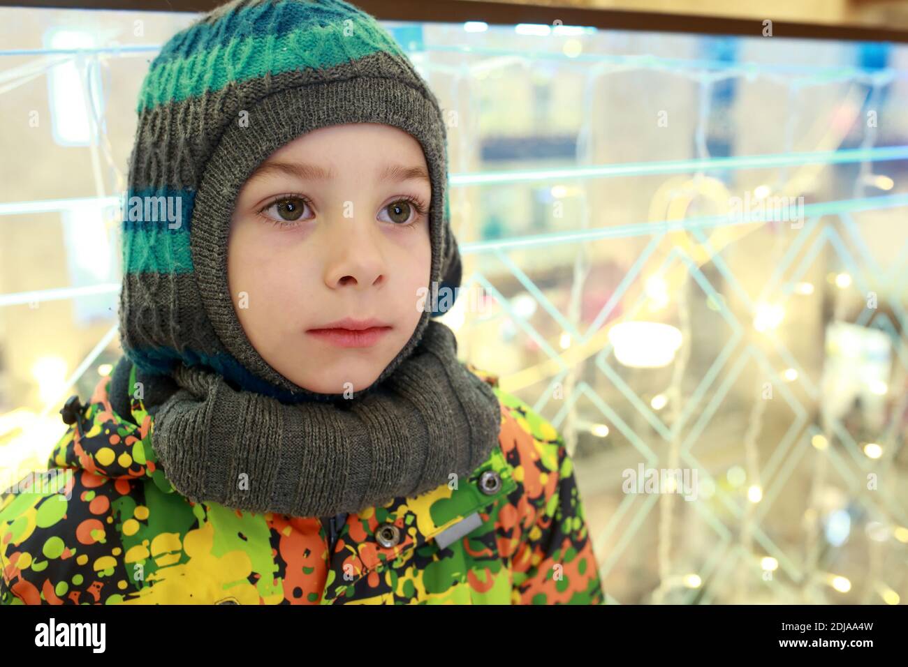 Portrait of a serious child in mall Stock Photo - Alamy