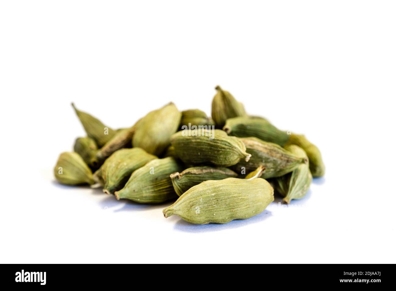Cardamom isolated on white background Stock Photo - Alamy