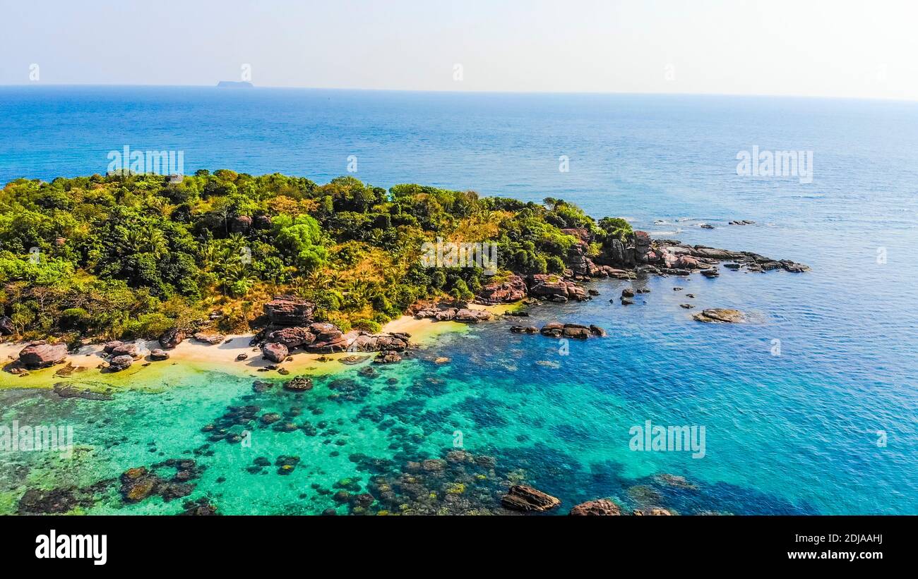 Aerial view of beautiful landscape, tourism boats, and people swimming ...