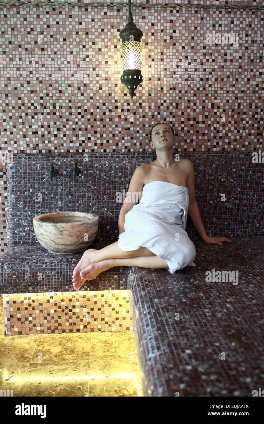Portrait of a woman relaxing in hammam Stock Photo - Alamy