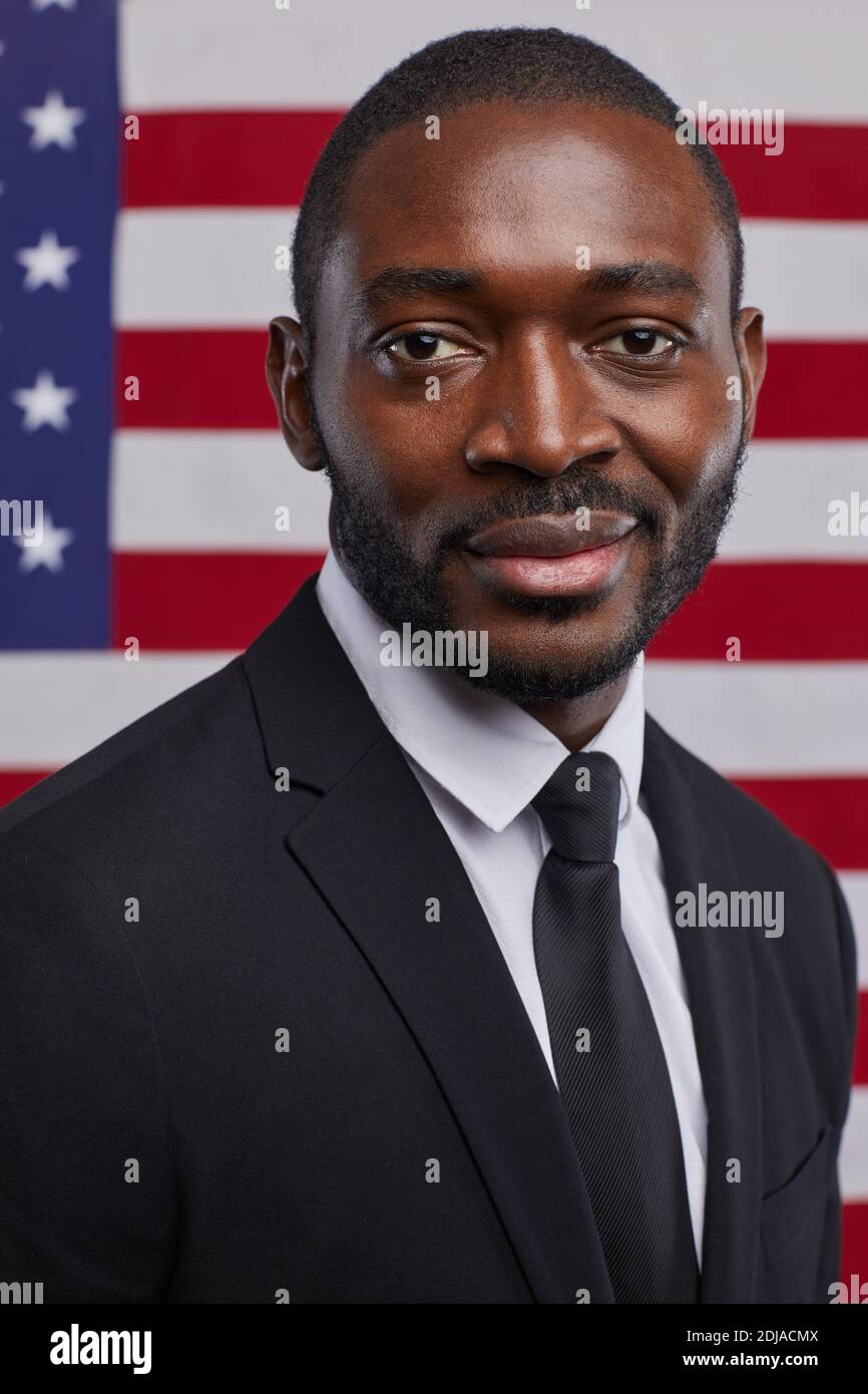 Vertical portrait of African-American politician looking at camera ...