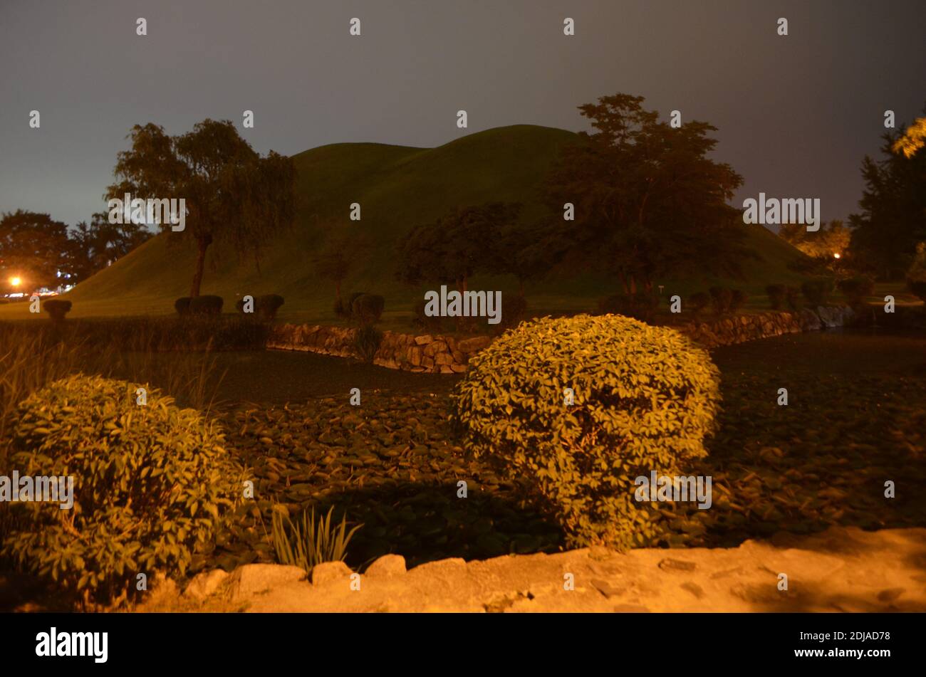 Ancient tumuli in the Tumuli Park (Daereungwon Tomb Complex), Gyeongju ...