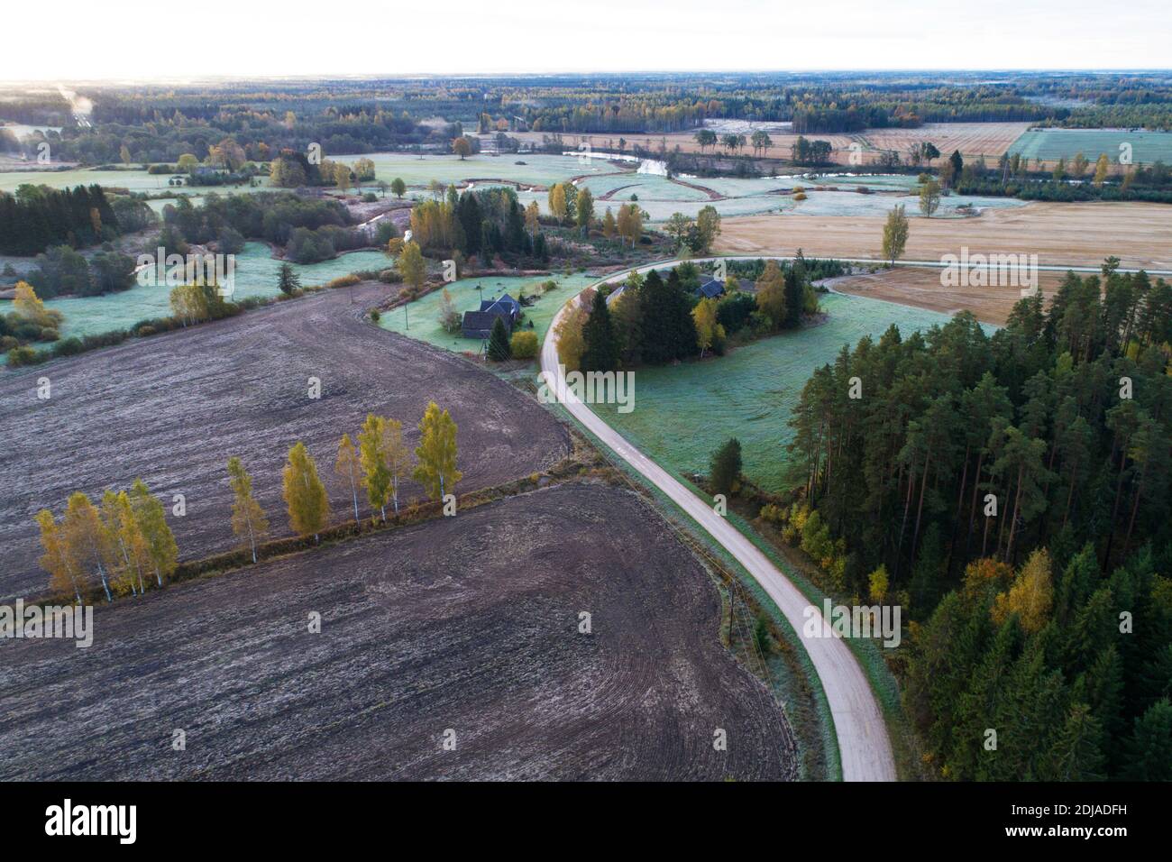 An aerial of a mosaic Estonian countryside landscape with small fields ...