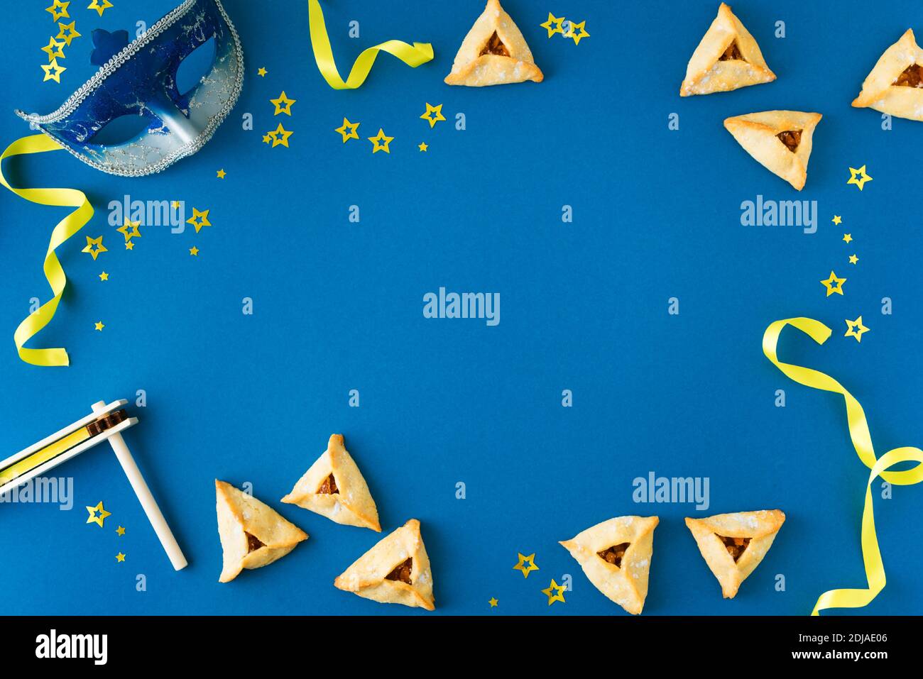 Purim celebration concept (jewish carnival holiday) on blue background ...