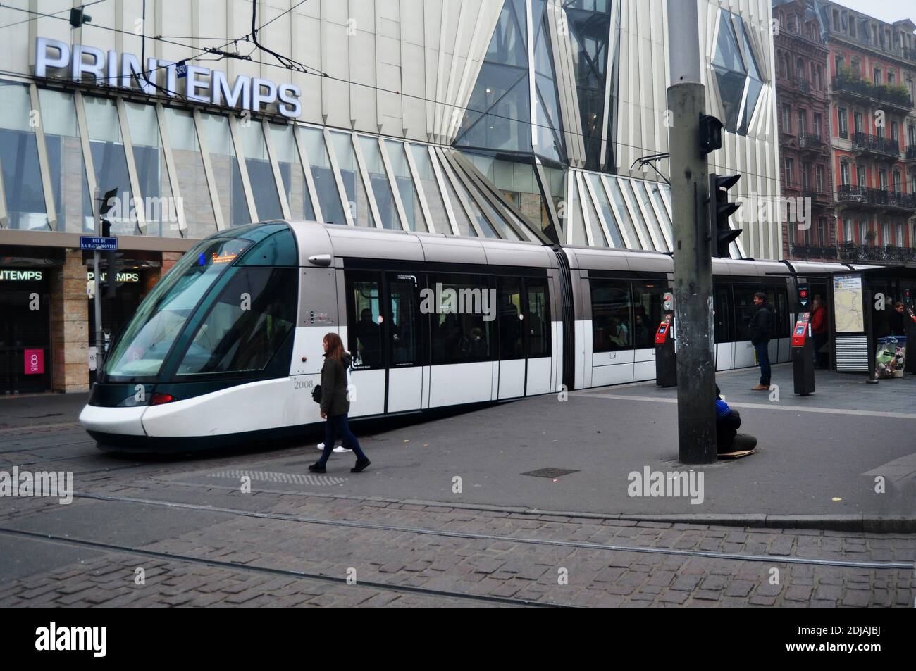 French people and travelers foreign walking and waiting tramway and bus ...