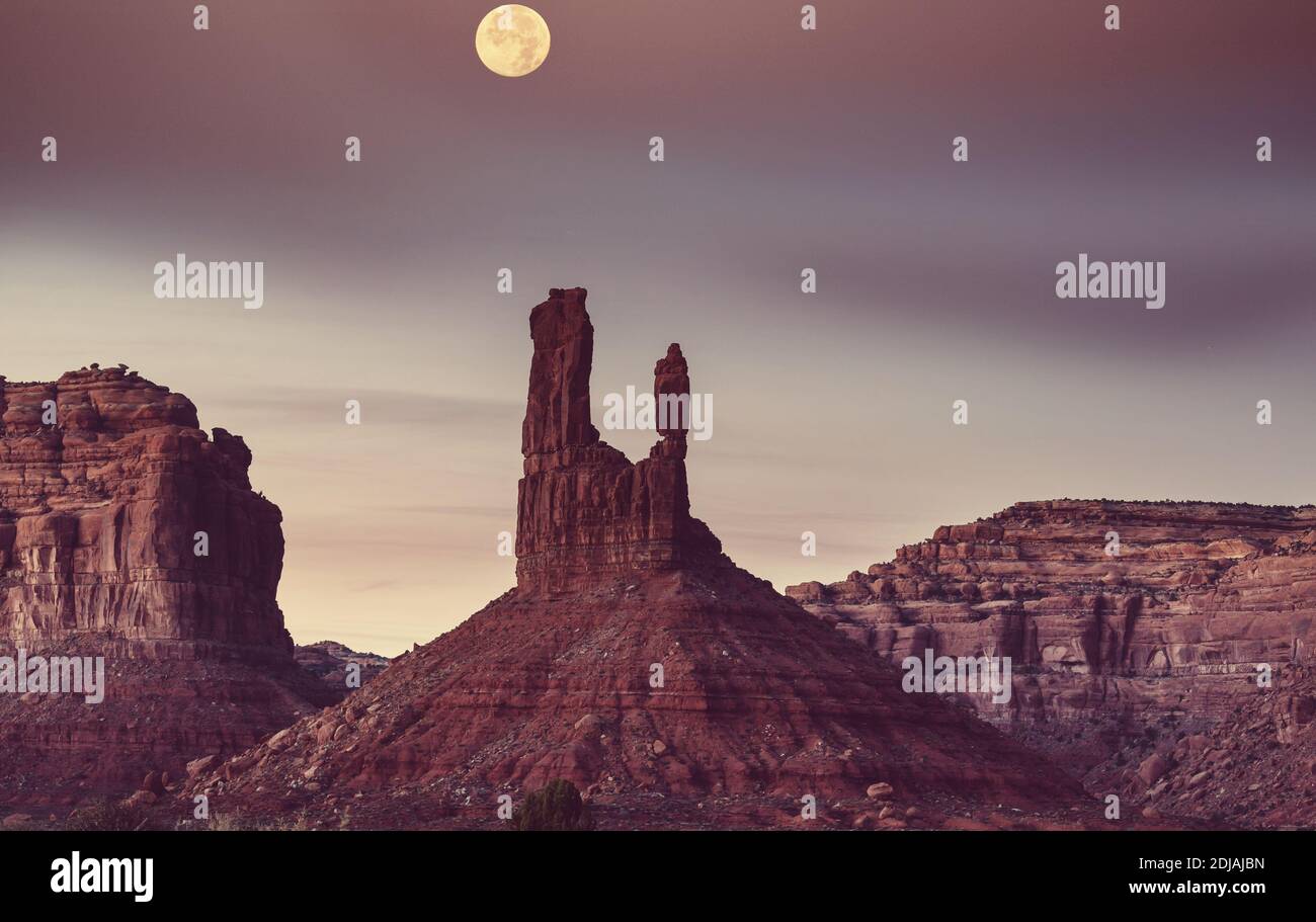 Valley of the Gods rock formation with Monument Valley at sunrise Stock ...