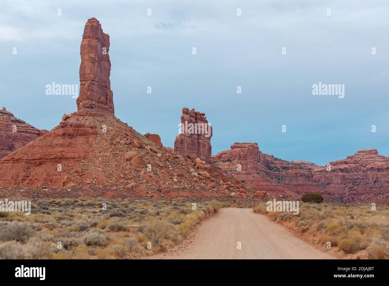 Valley of the Gods rock formation with Monument Valley at sunrise Stock ...