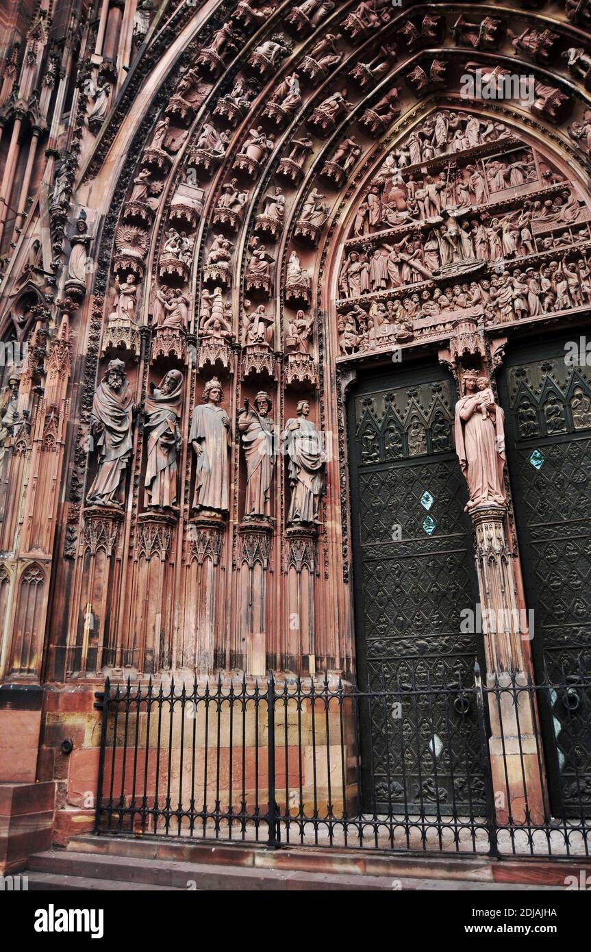 Ancient priest statue and ruin building of Strasbourg Church or the ...