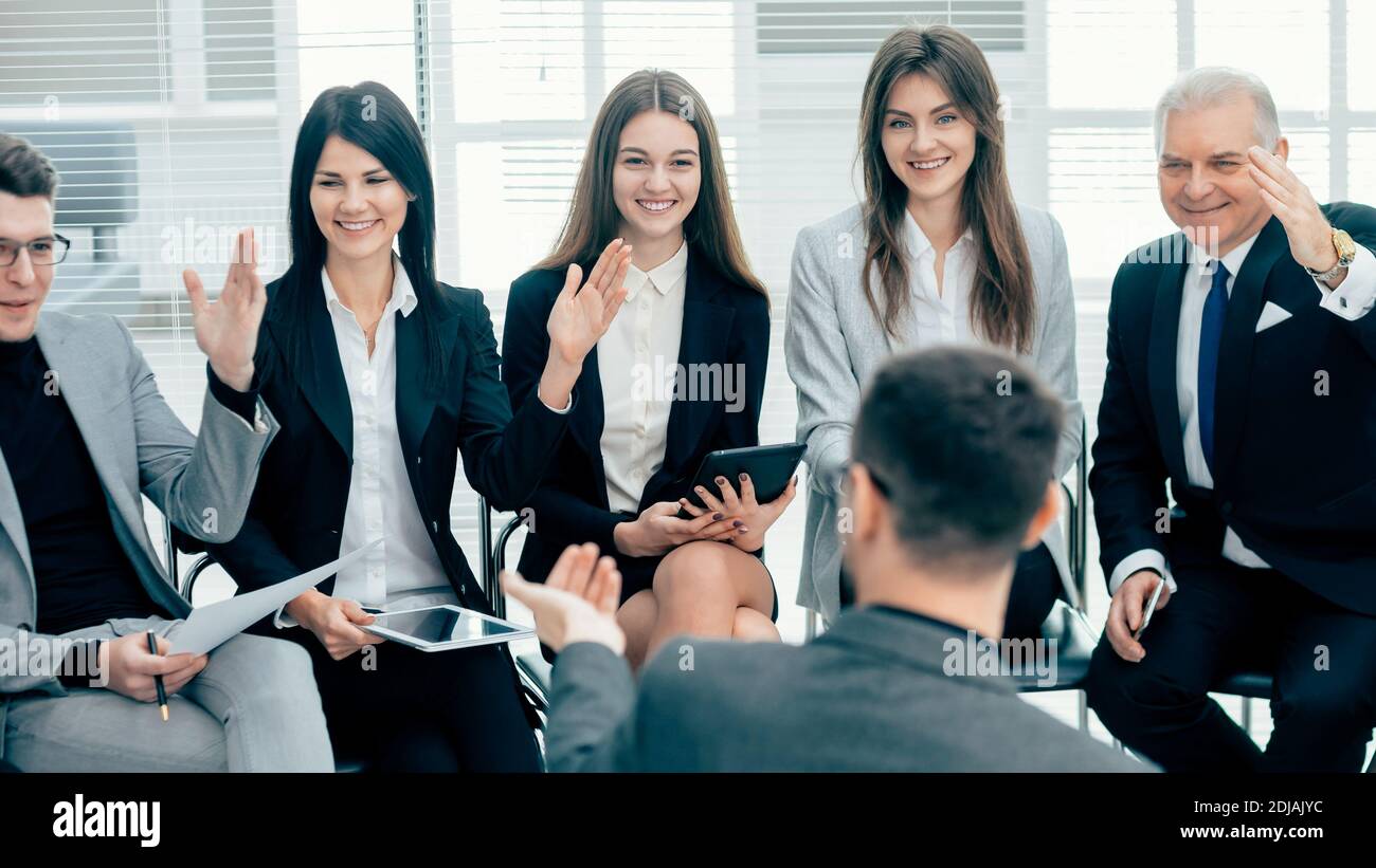 employees asking questions at a meeting with the project Manage Stock ...