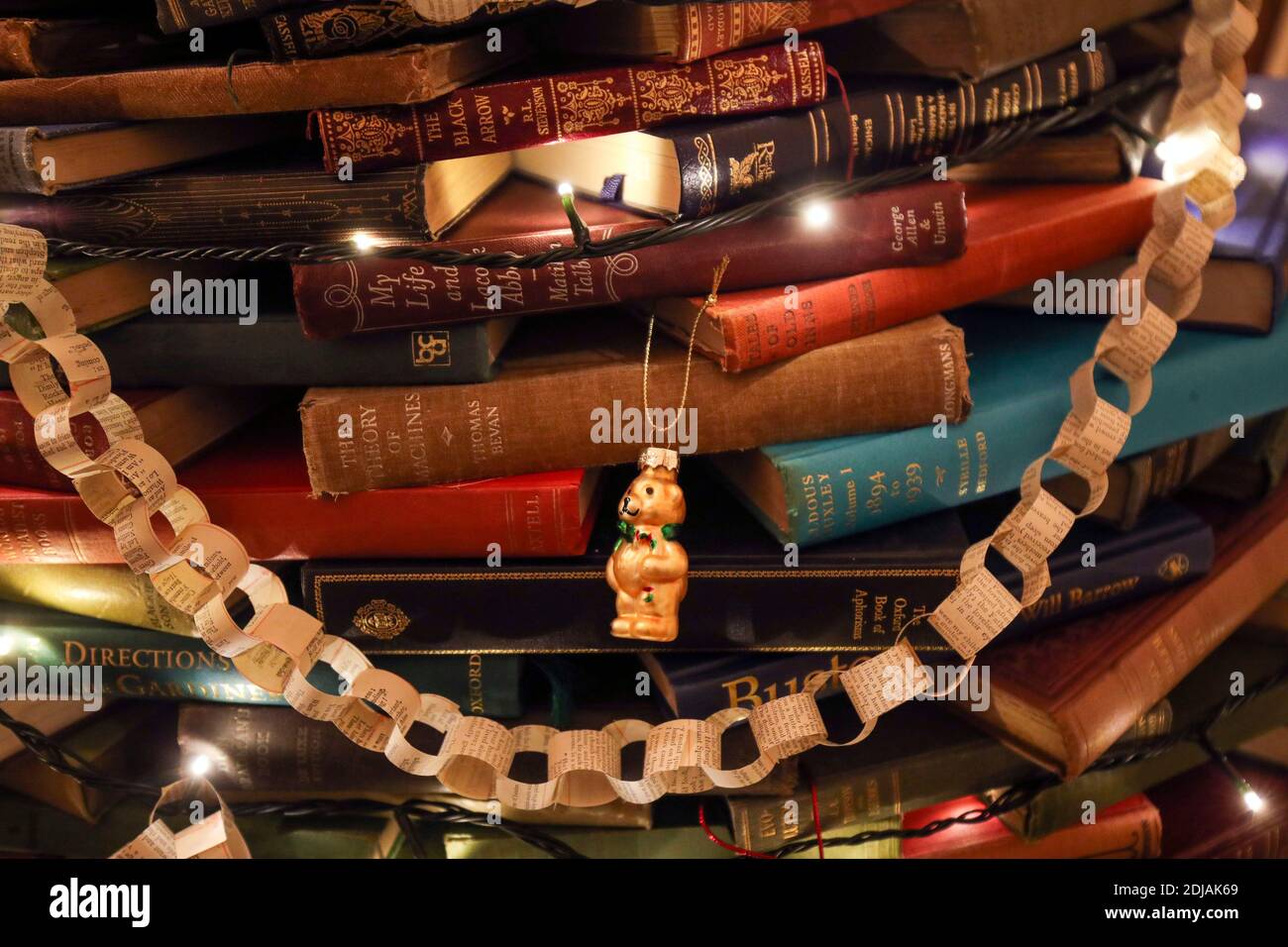 A Christmas tree, crafted entirely from books, in the library at the ...