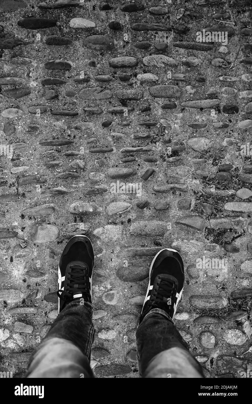 Natural stone floor and person walking, walk and sport Stock Photo - Alamy
