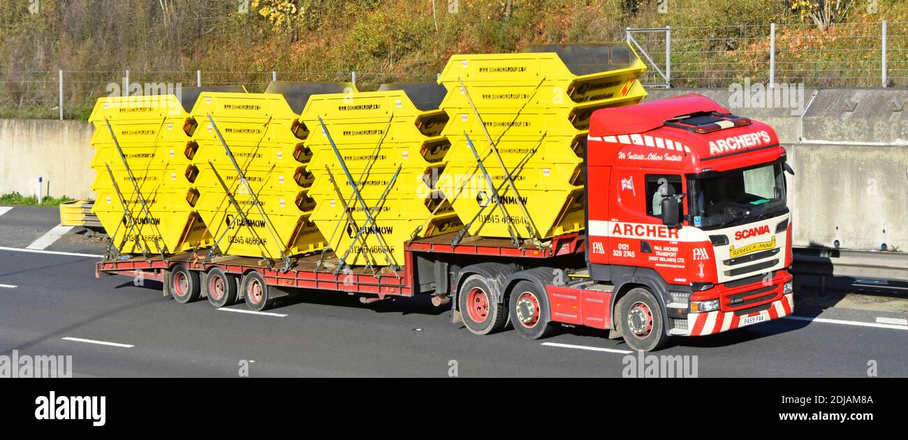 Haulage business lorry truck & low loader delivery trailer loaded with ...