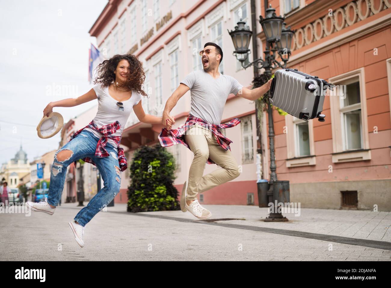 Couple jump city hi-res stock photography and images - Alamy