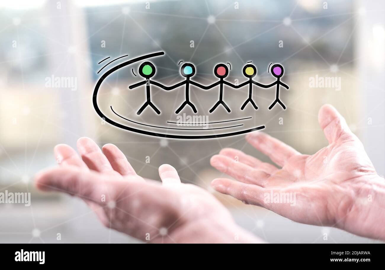 Teamwork concept above the hands of a man Stock Photo - Alamy